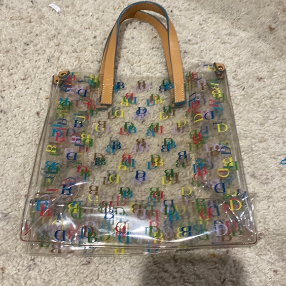 Dooney & Bourke | Bags | Dooney And Bourke Clear Plastic Signature Small Tote | Poshmark